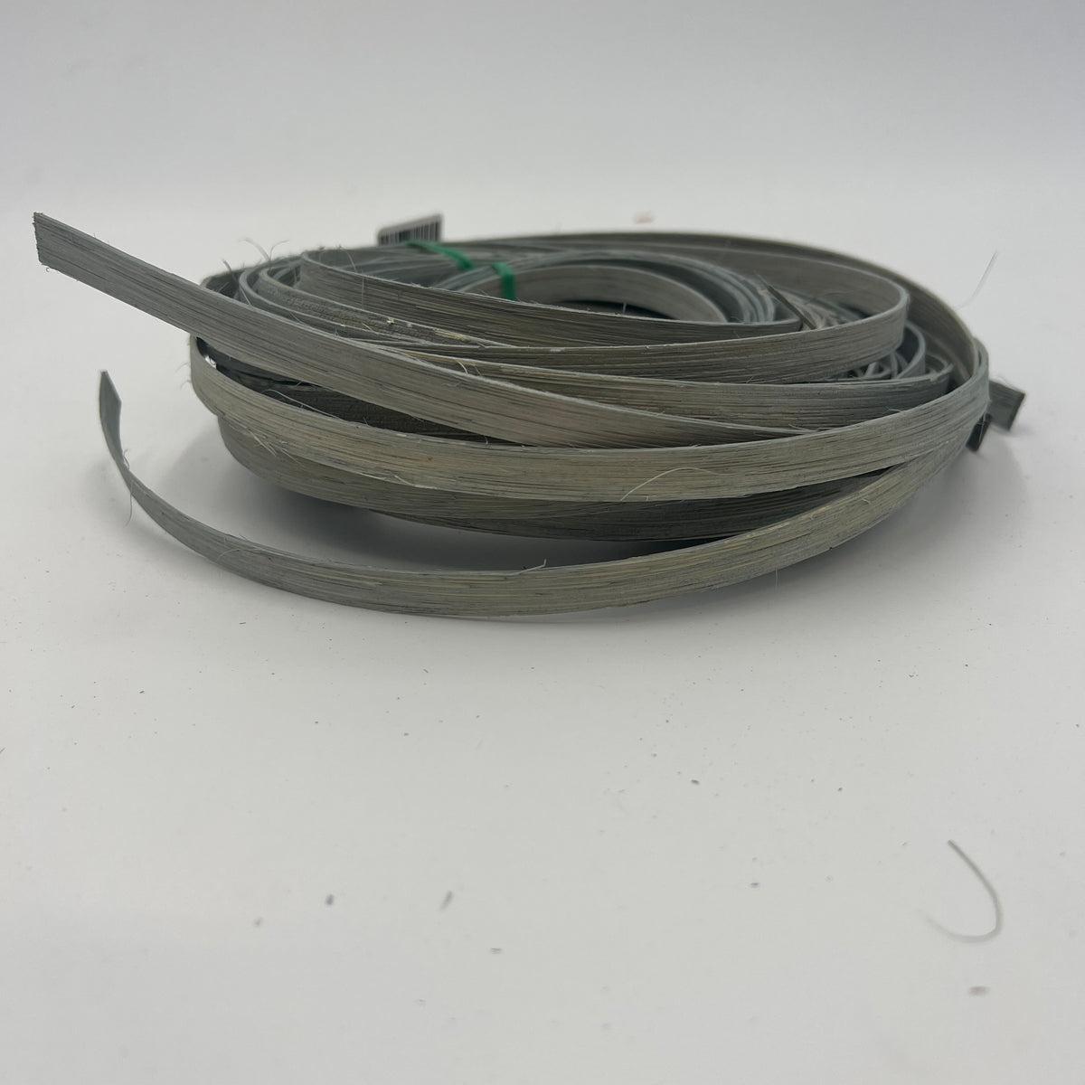 Antique Gray - 3/8" Flat - Dyed Reed (1/4 lb coil) – Basket Makers Supply