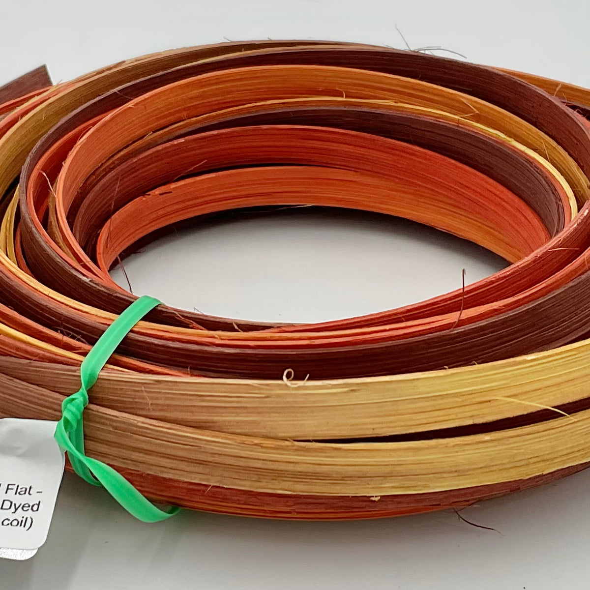 Cornucopia - 3/8" Flat - Variegated/Space Dyed Dyed Reed (1/4 lb coil ...